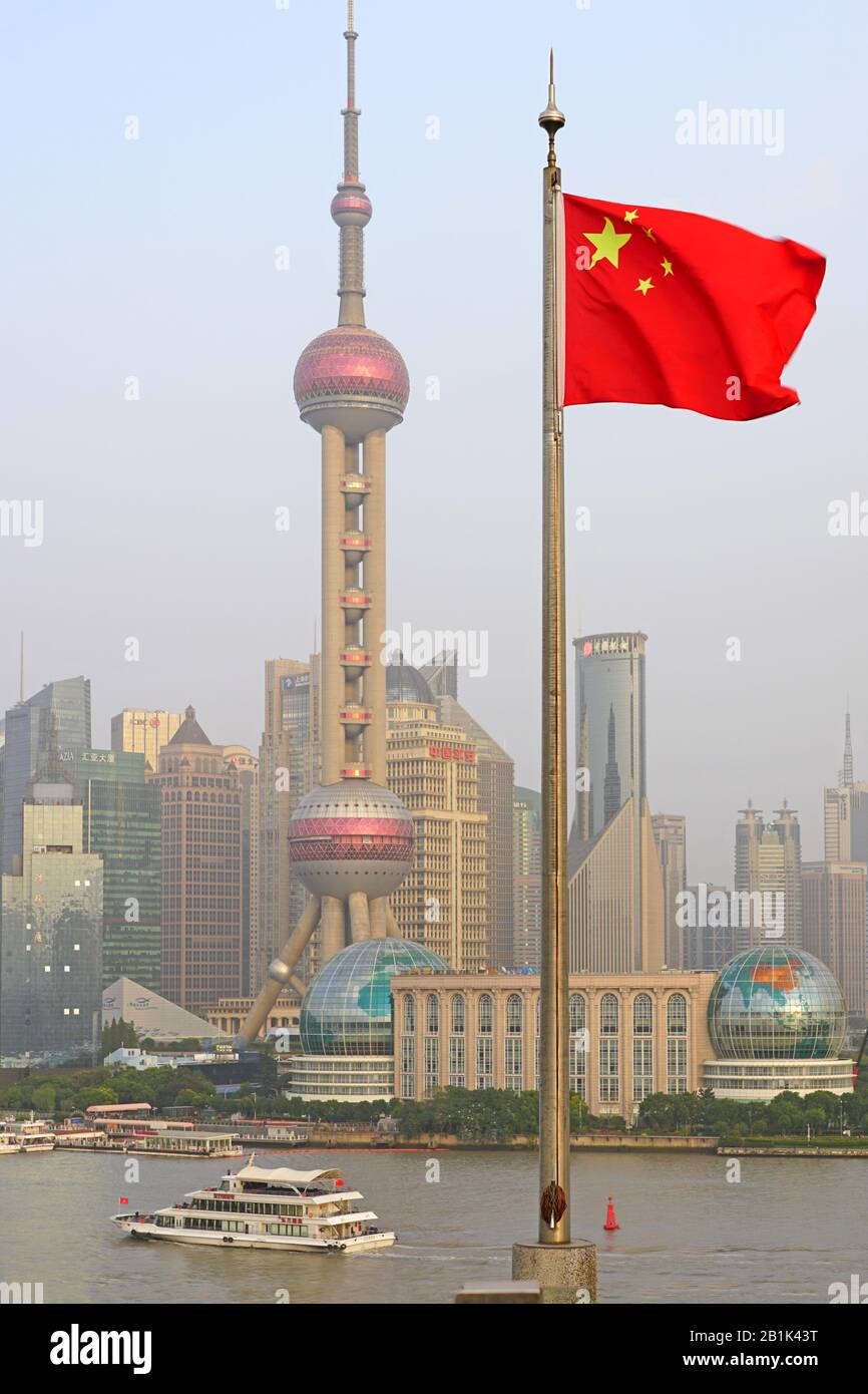 SHANGHAI, CHINA -29 OCT 2019- A Chinese flag floating in front of a ...