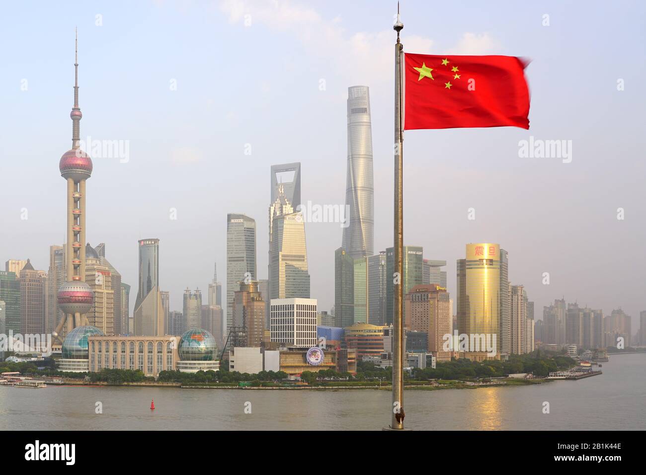SHANGHAI, CHINA -29 OCT 2019- A Chinese flag floating in front of a ...