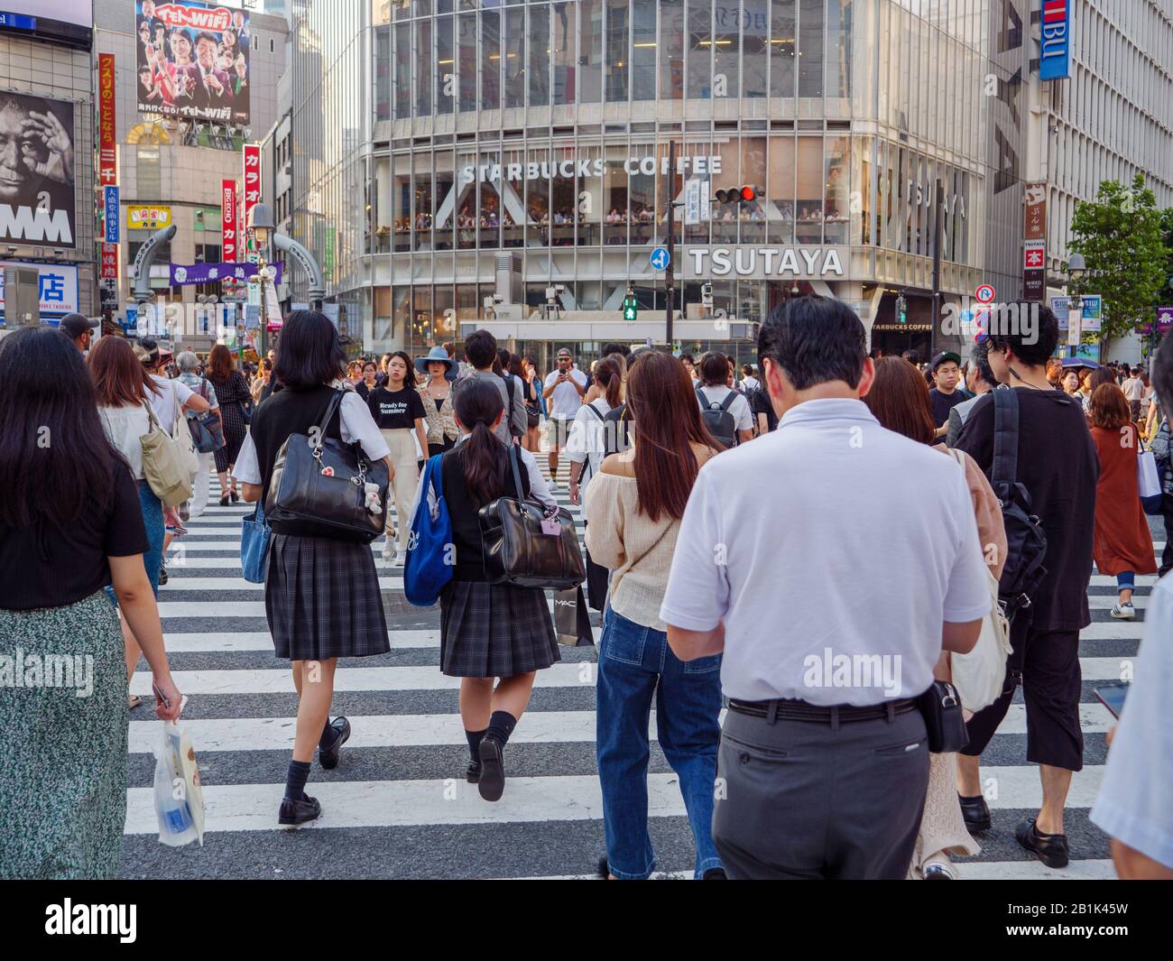 Shibuya, Japan - 23 9 19: A business man In the crowd crossing the ...