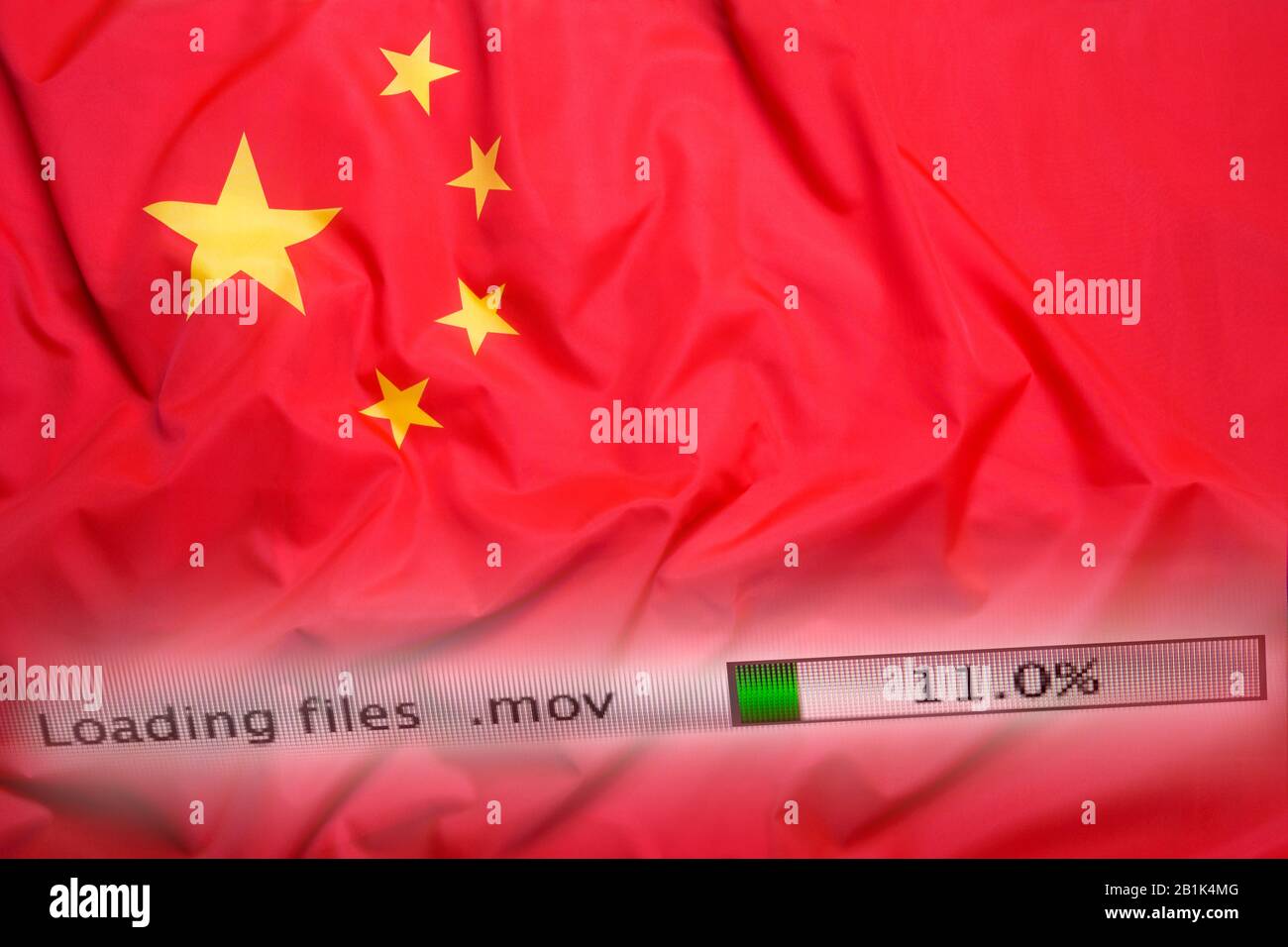 Downloading files on a computer with China flag Stock Photo - Alamy
