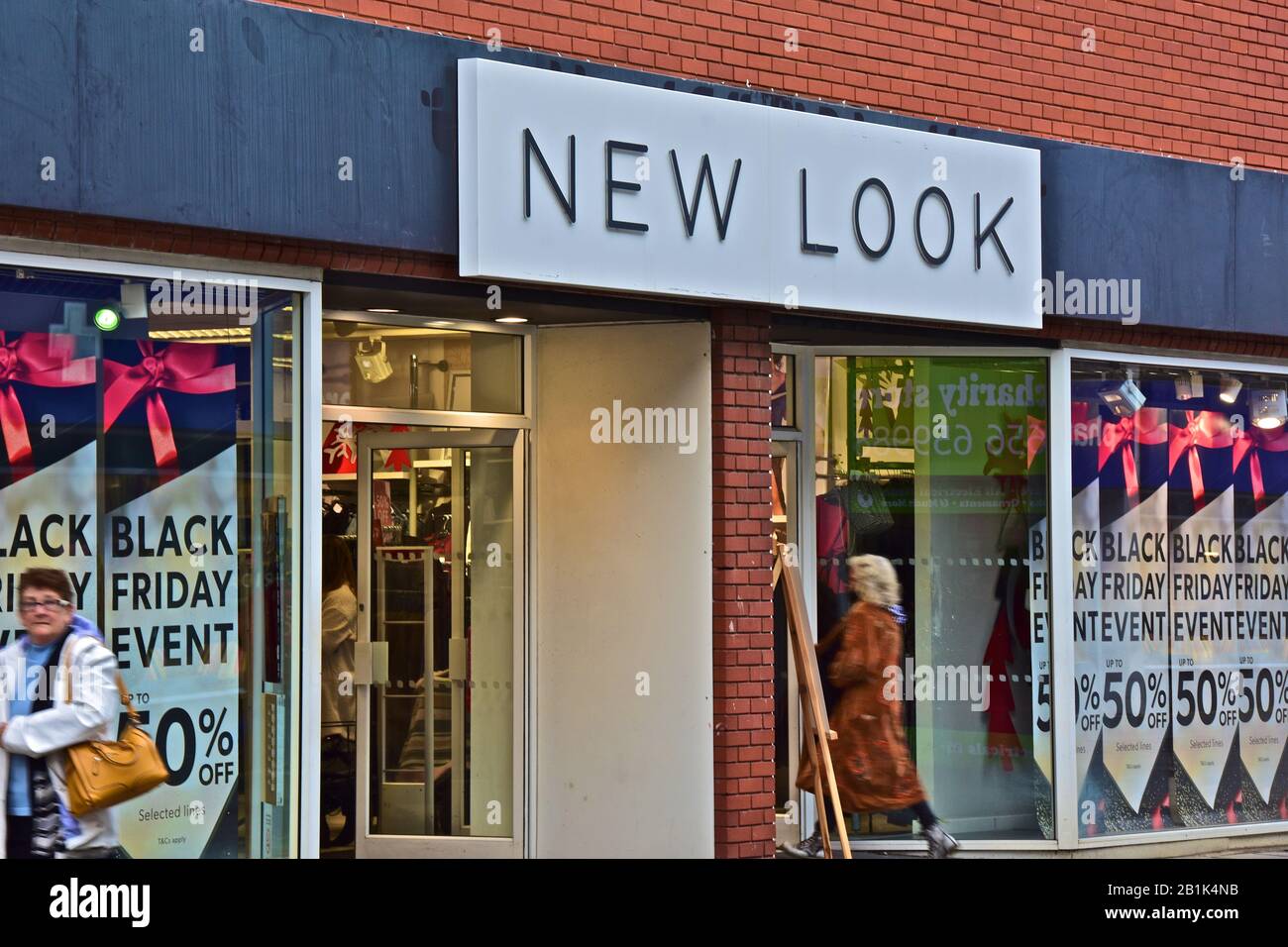 A woman walks into the front entrance of the New Look store in Caroline ...