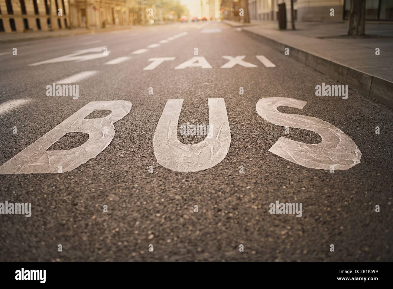 Bus taxi lane sign in hi-res stock photography and images - Alamy