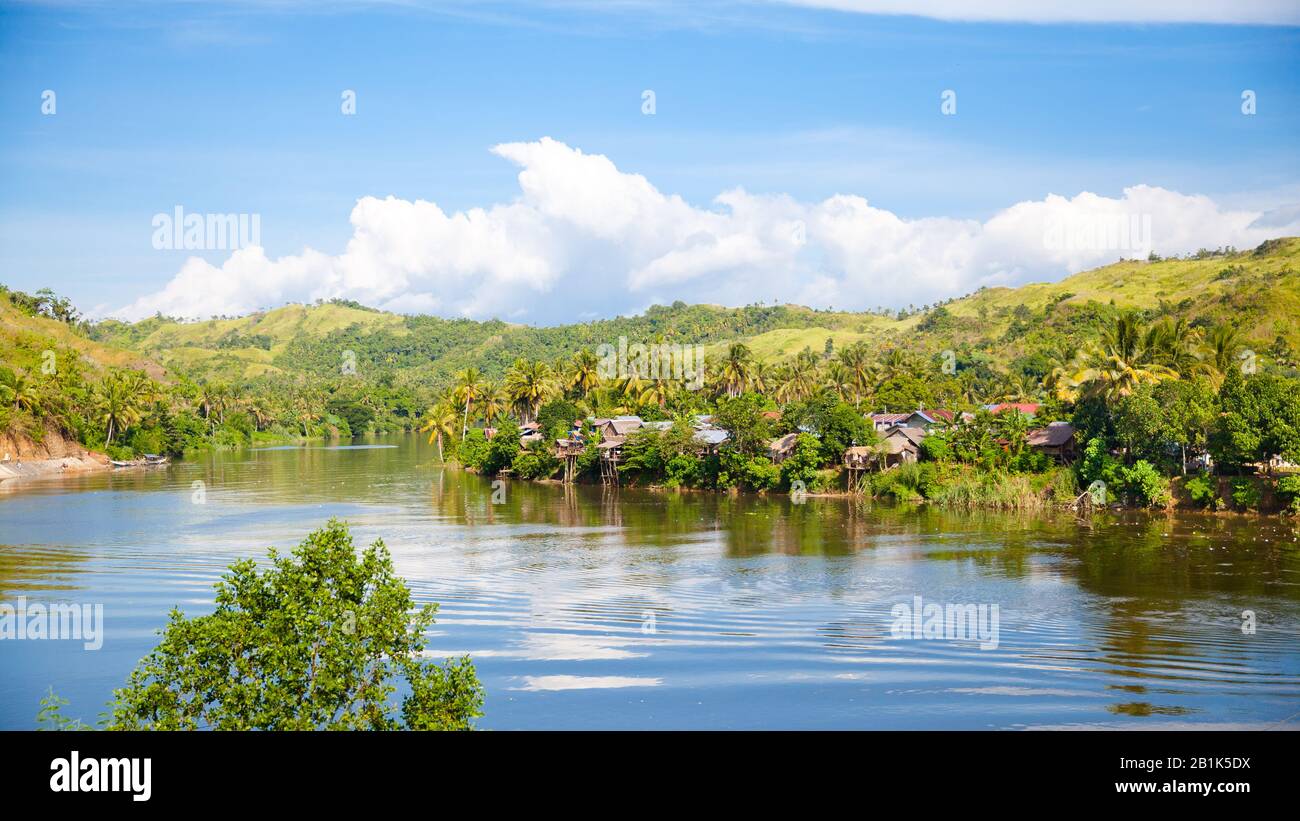 River and green hills. Beautiful natural scenery of river in southeast ...