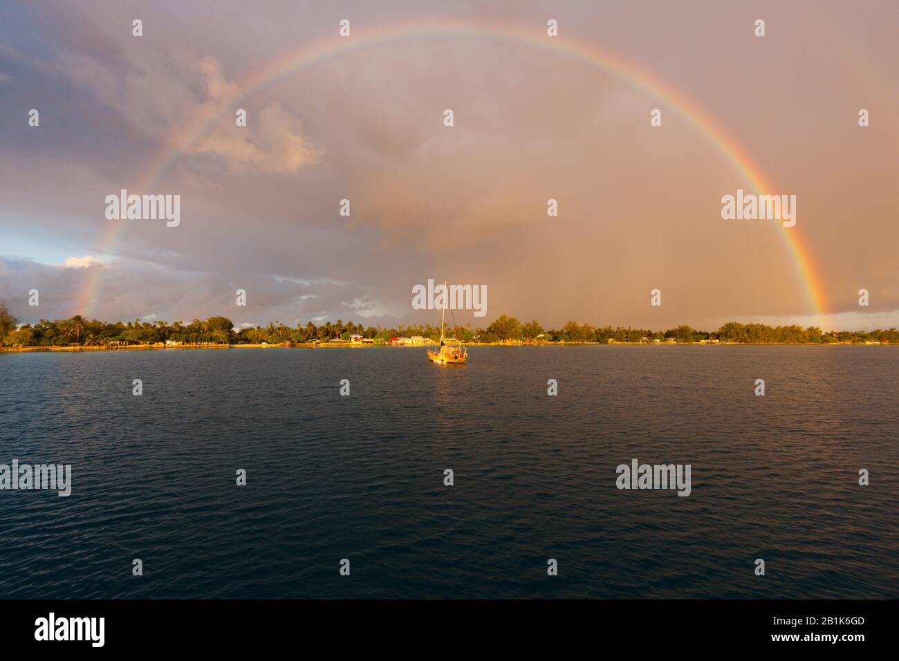 Rainbow in front of Rotoava, Fakarava, Tuamotu Archipel, French ...