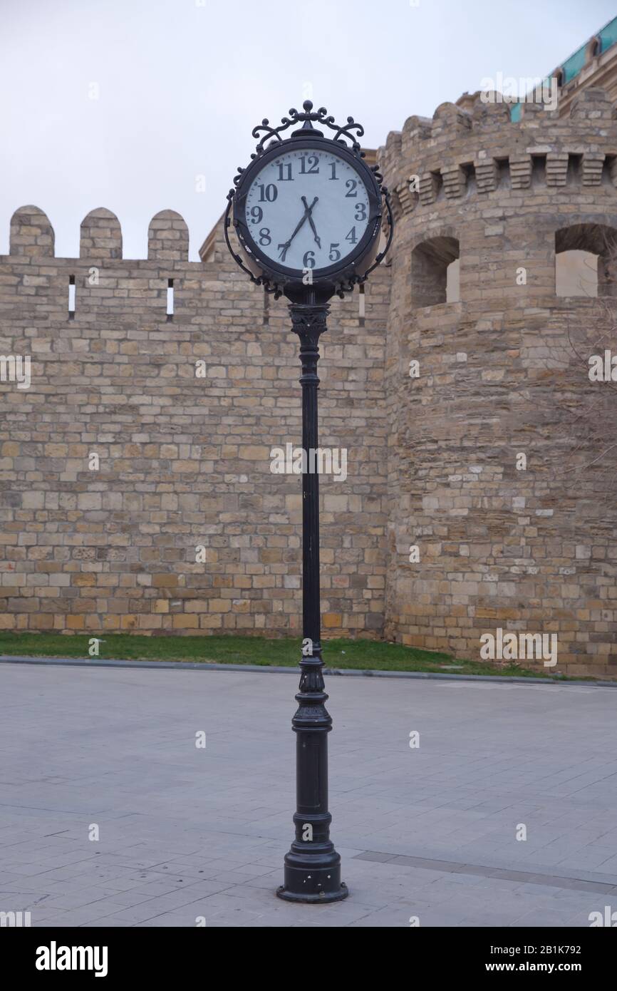 Antique street clock on pillar hi-res stock photography and images - Alamy