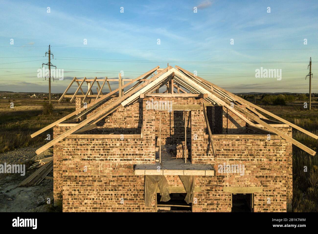 Private residential house with wooden roof frame structure under ...