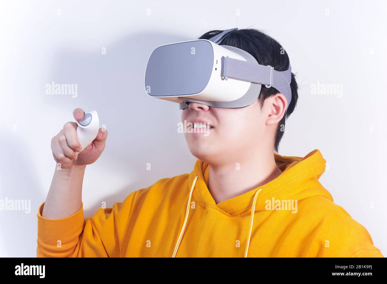 People wearing glasses playing vr virtual reality with a handle Stock ...