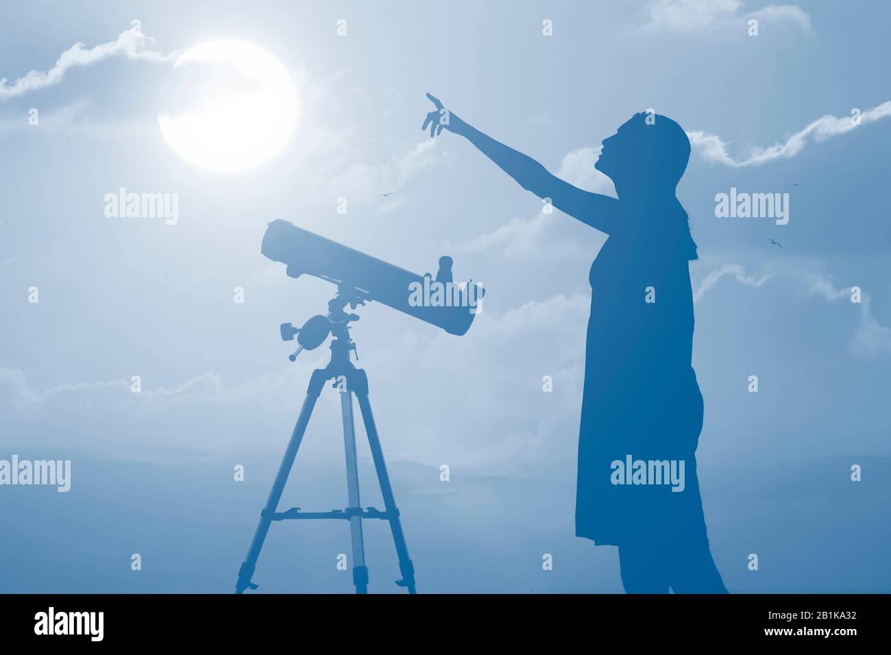 Silhouette of a woman against beautiful romantic sunset sky with clouds ...