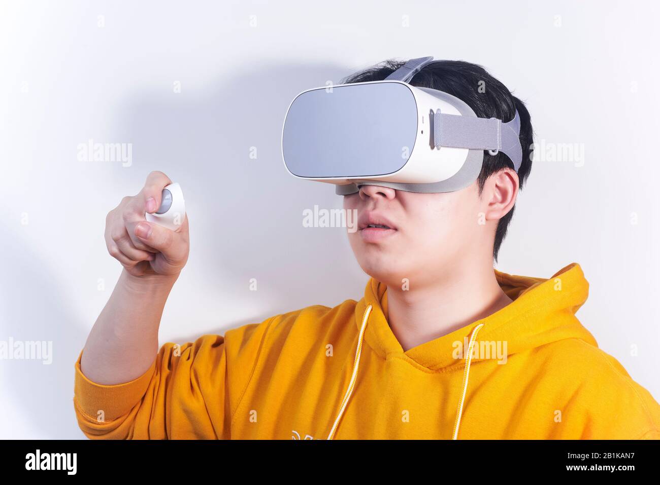 People wearing glasses playing vr virtual reality with a handle Stock ...