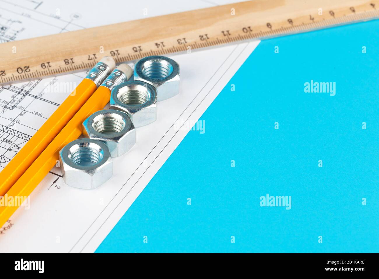 nuts and parts of the construction are laid out in a dented drawing ...