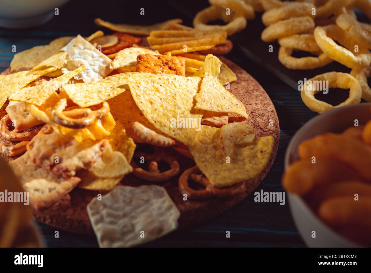 Snack mix. Salty treat for snacking. Dark background Stock Photo - Alamy