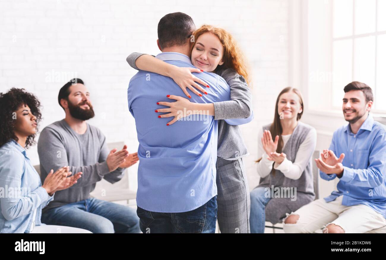 Happy People Embracing And Applauding To Each Other After Therapy ...