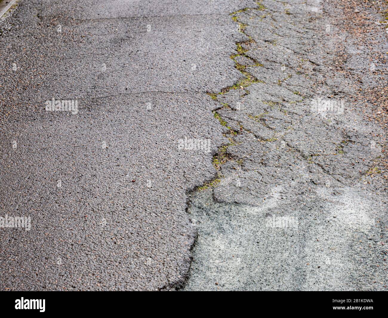 Road damage on a street Stock Photo - Alamy