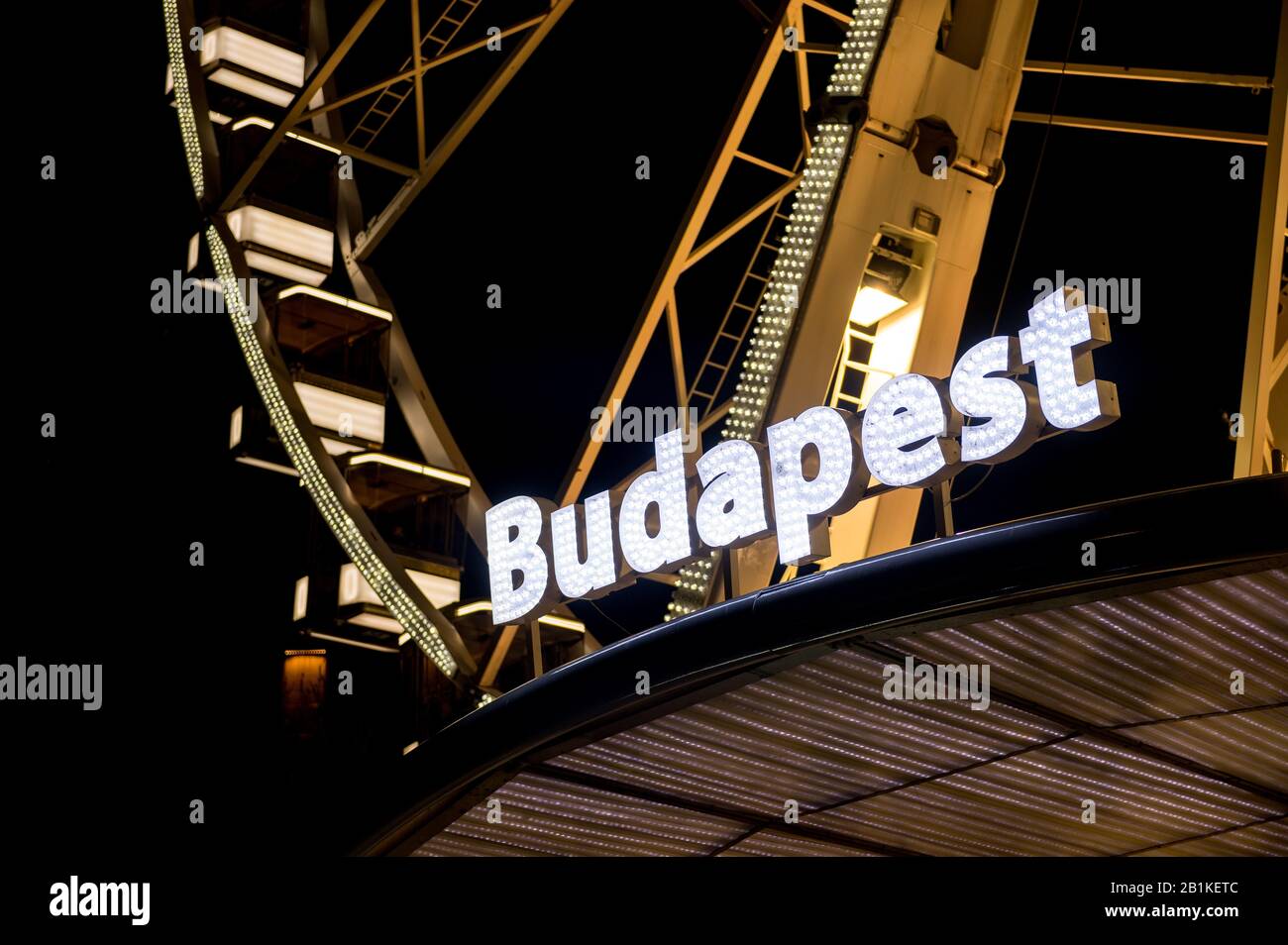 Budapest sign at night on Budapest Eye ferris wheel Stock Photo - Alamy