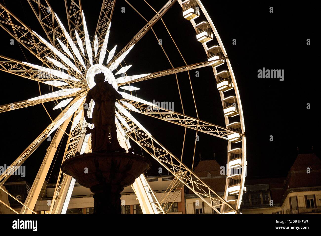 Budapest Eye ferris wheel at night with Danube fountain figure Stock ...