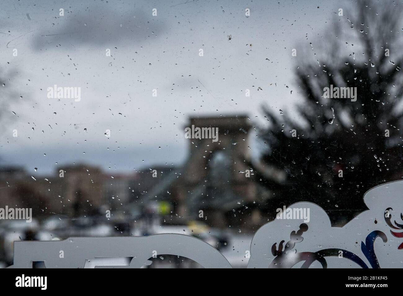 view through the rainy window of Budapest Castle Hill Funicular over ...