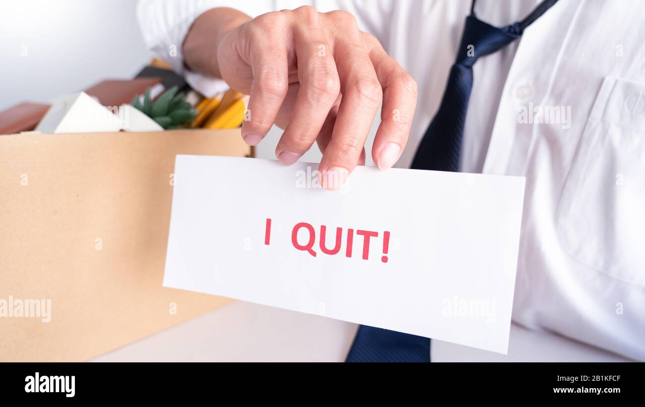 Businessman holding with I quit words card letter, resign employee ...