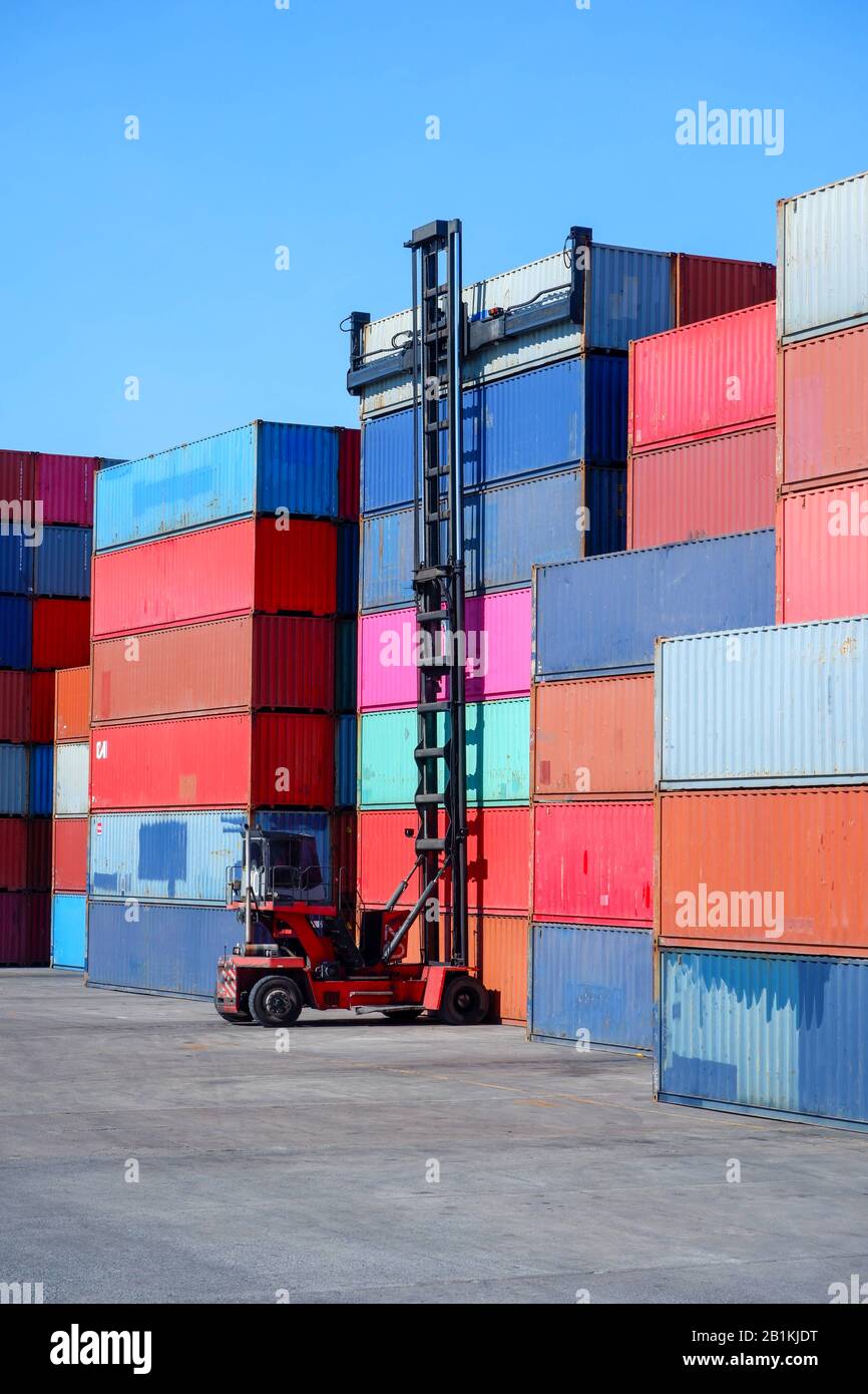 Container handlers in the harbor For imports and exports Stock Photo ...