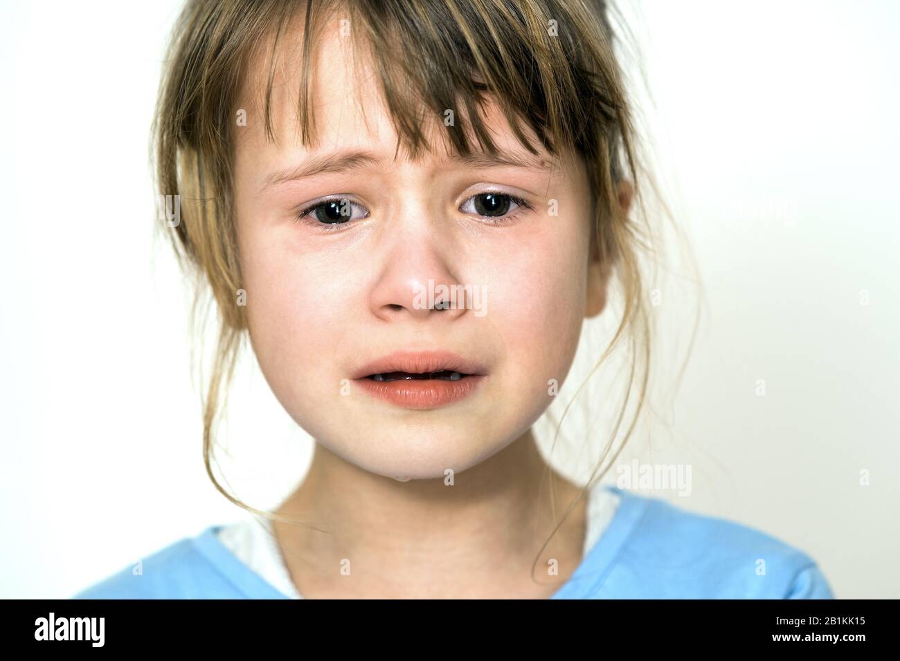Closeup portrait of sad crying child girl Stock Photo - Alamy