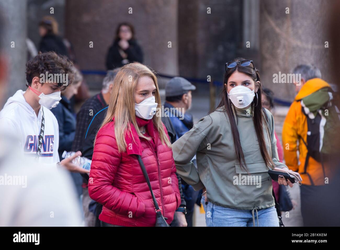Roma, Italy. 25th Feb, 2020. People wear antivirus masks to protect ...