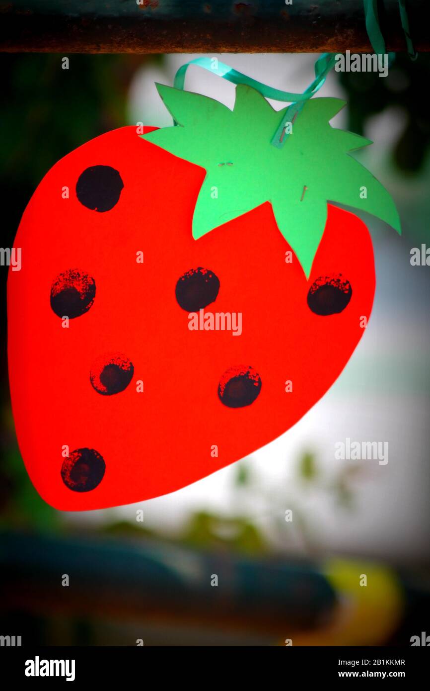 stylized strawberry on cardboard Stock Photo - Alamy