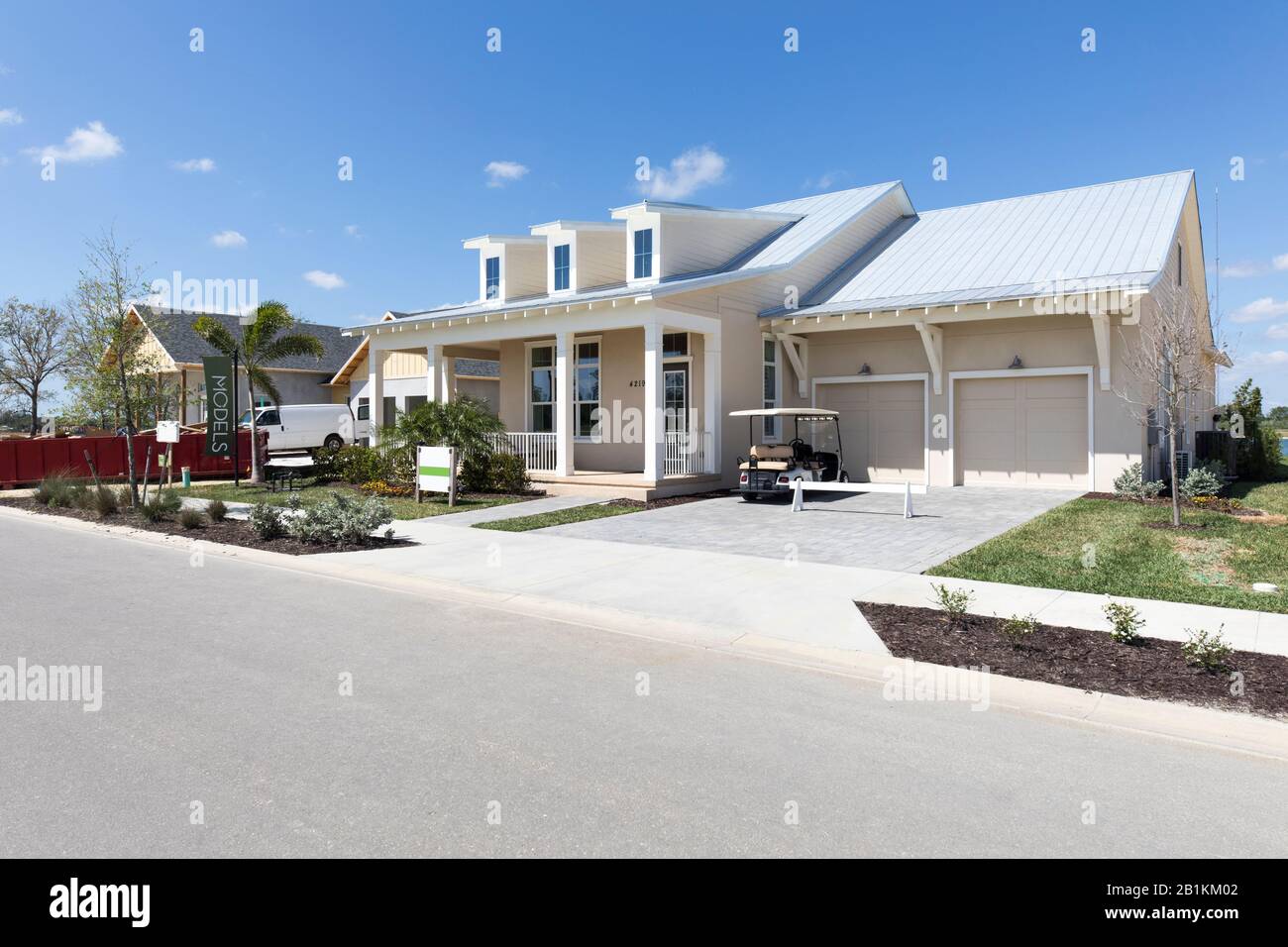 One of many model homes at Babcock Ranch, including a two car garage ...