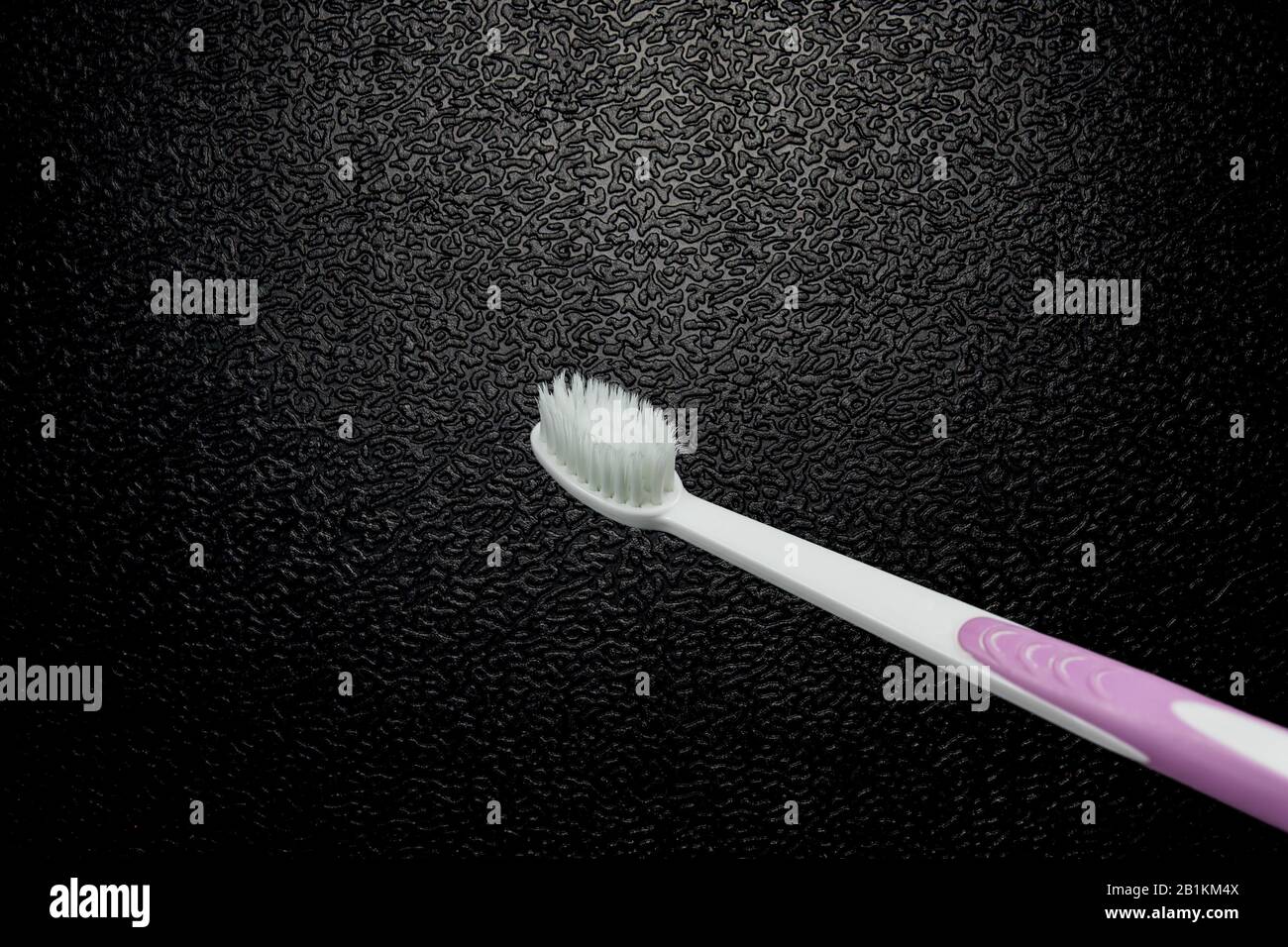 toothbrush with white bristles Stock Photo - Alamy