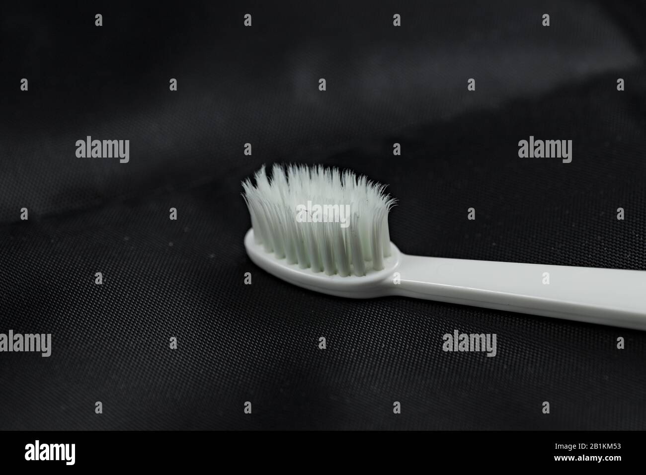 toothbrush with white bristles Stock Photo - Alamy
