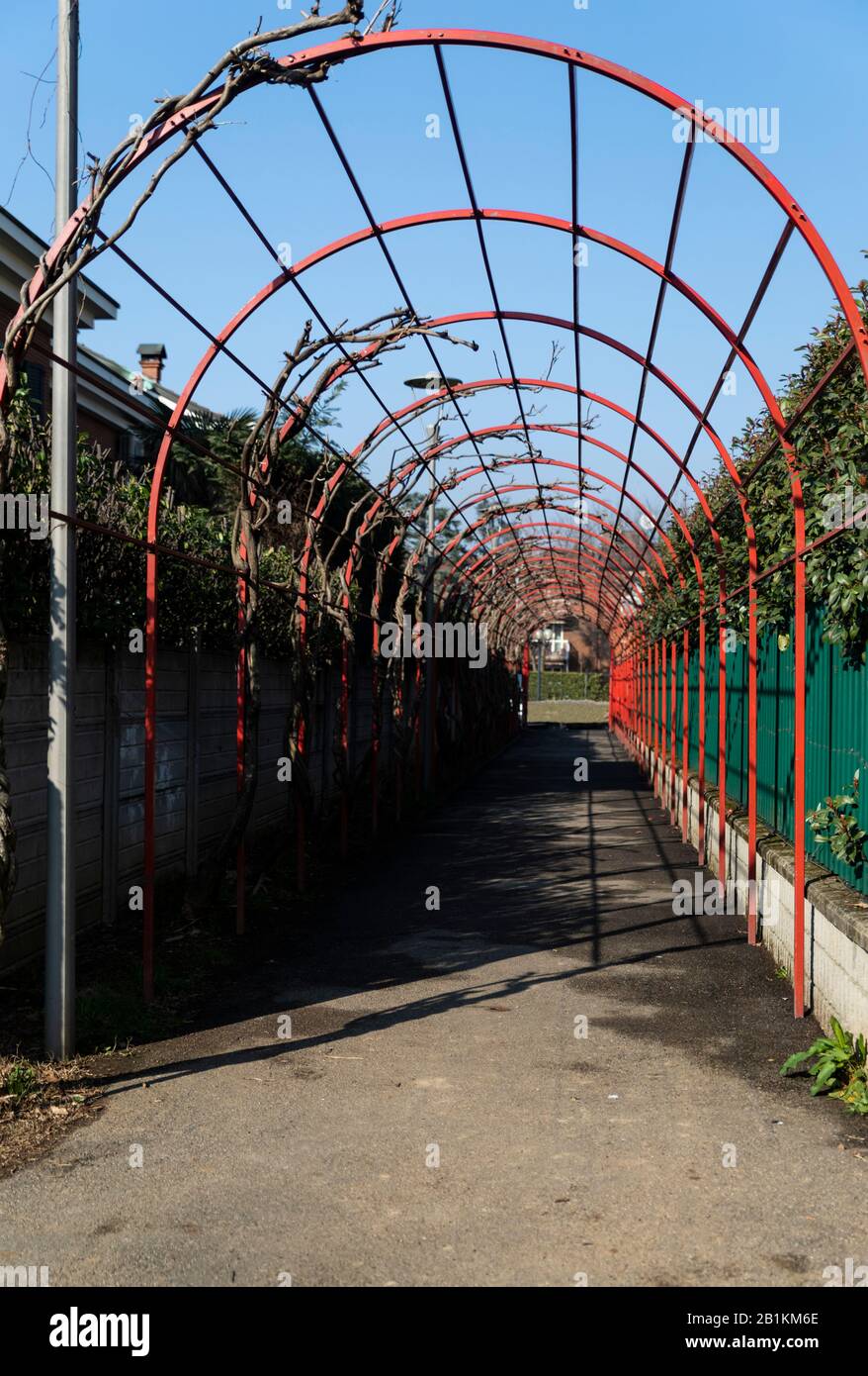 red metal arch that forms a tunnel Stock Photo - Alamy