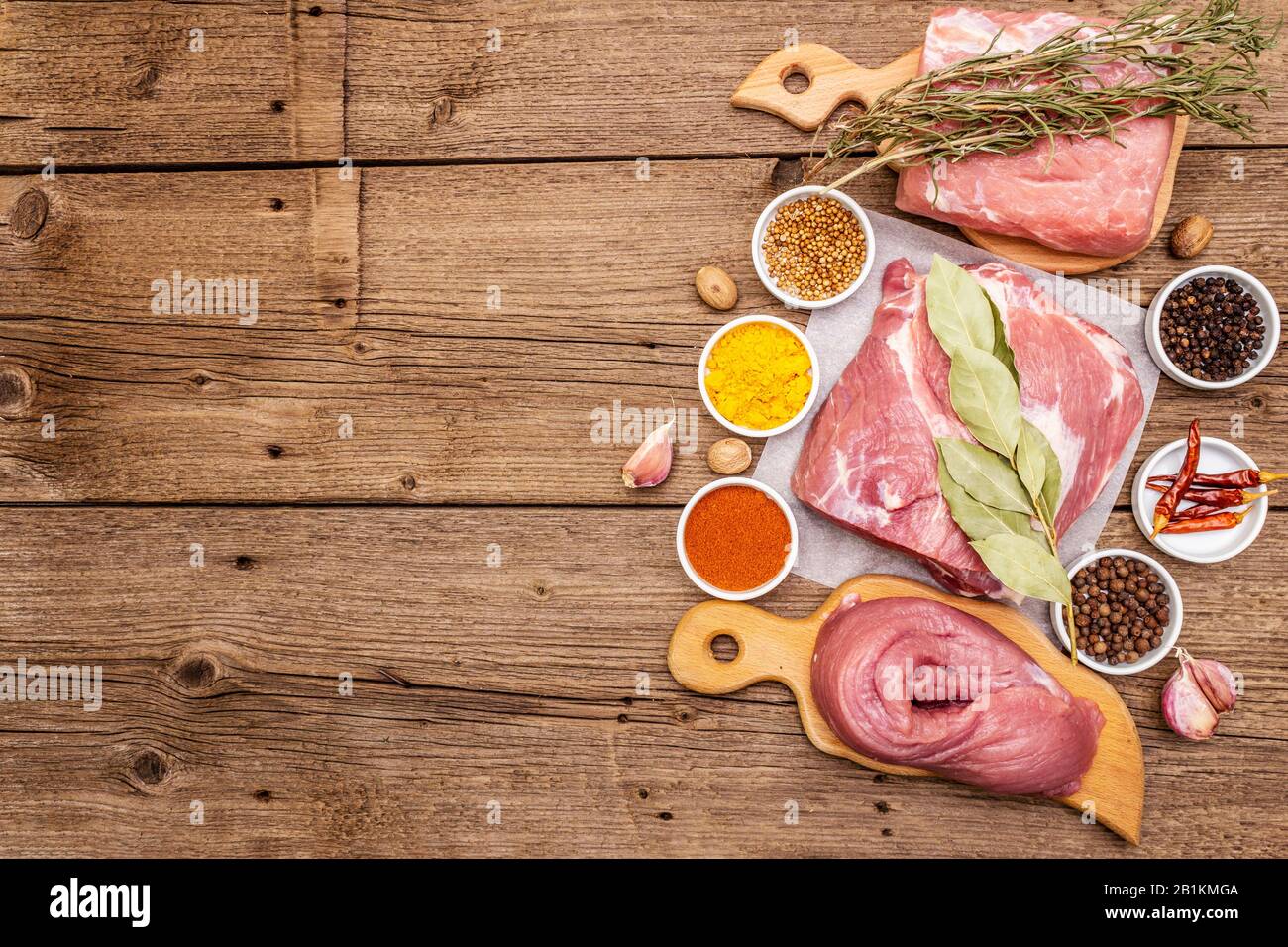 Assorted various fresh pork cuts. Raw meat with spices. Tenderloin ...