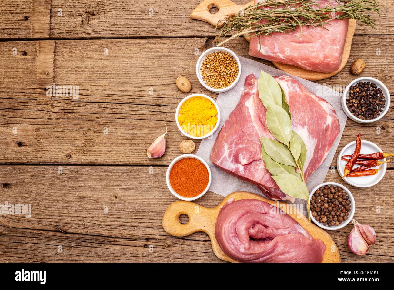 Assorted various fresh pork cuts. Raw meat with spices. Tenderloin ...