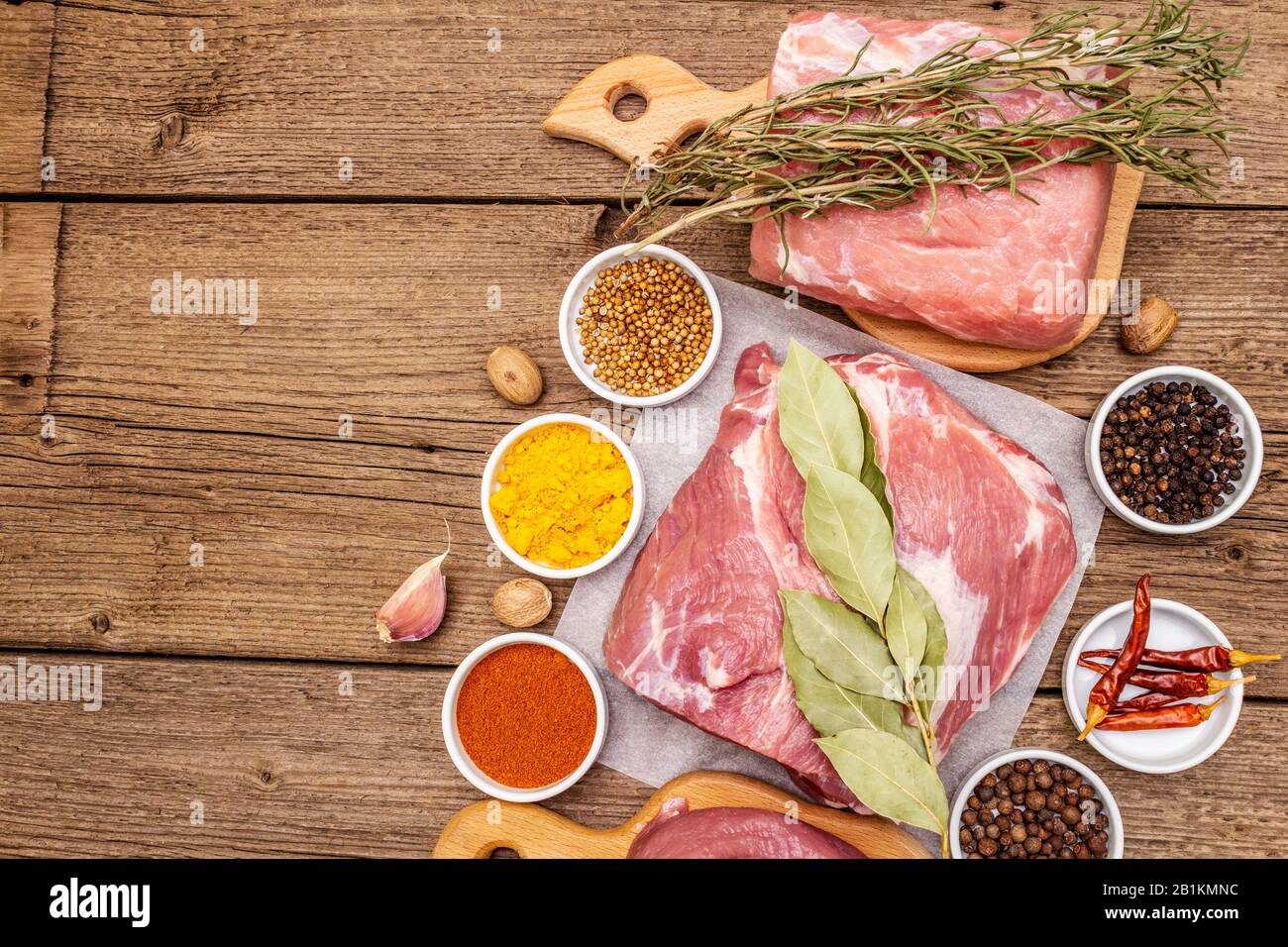 Assorted various fresh pork cuts. Raw meat with spices. Tenderloin ...