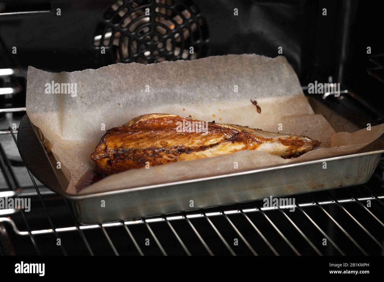 Baking sheet fried fish hi-res stock photography and images - Alamy