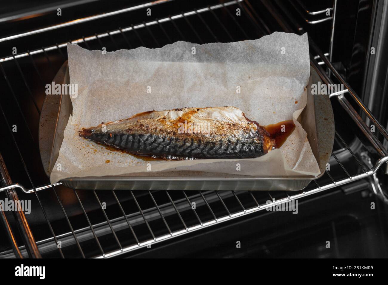 Baking sheet fried fish hi-res stock photography and images - Alamy