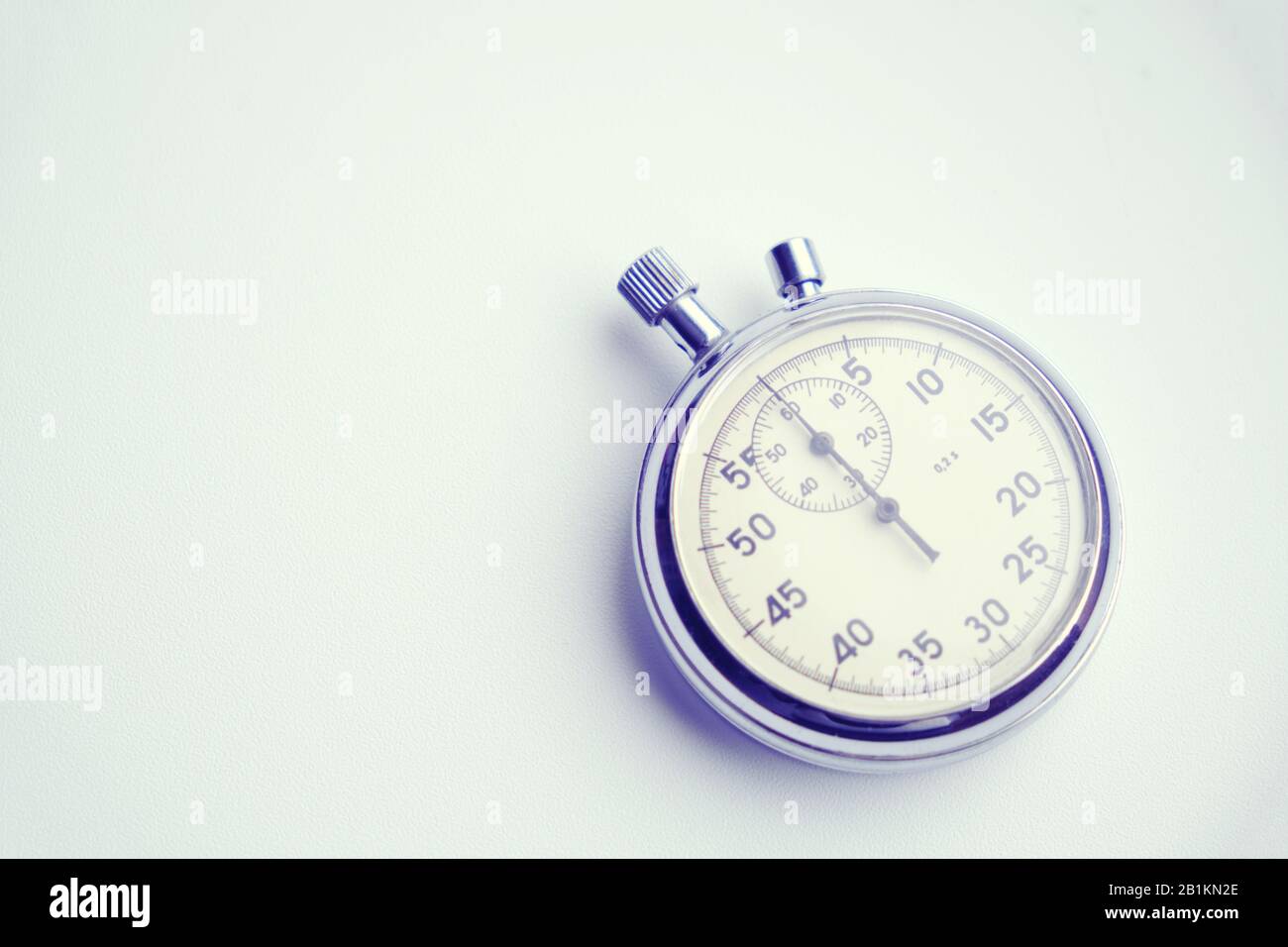 Retro mechanical stopwatch on a white background Stock Photo - Alamy