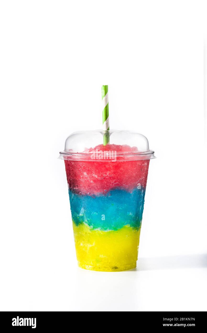 Colorful slushie with straw in plastic cup isolated on white background ...