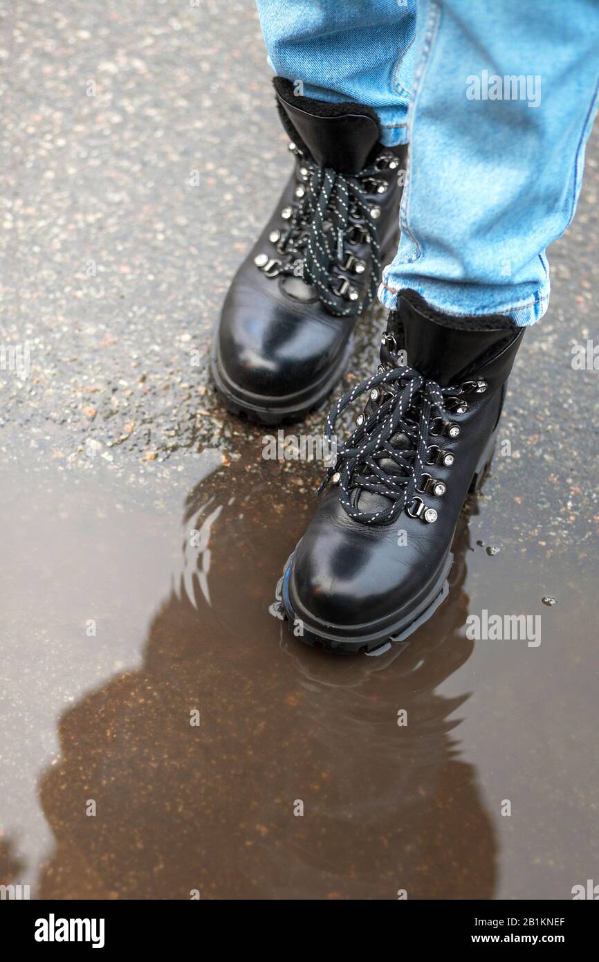 Puddle on the pavement hi-res stock photography and images - Alamy