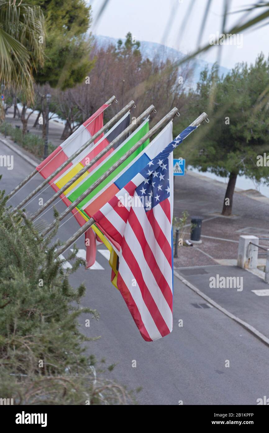 Usa and International Countries Flags at Flagpoles Stock Photo - Alamy