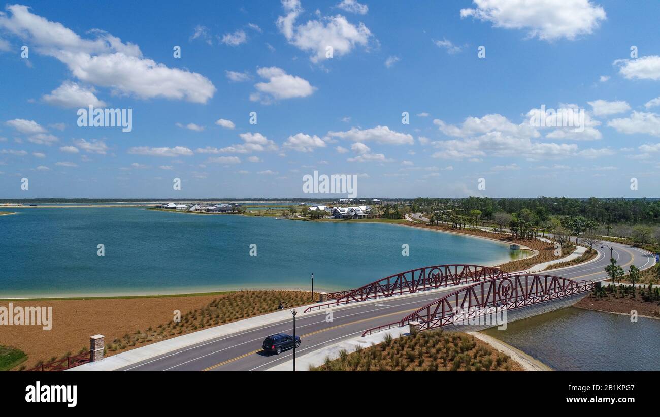 Entry driveway road past the sign and bridge to Babcock Ranch, Florida ...