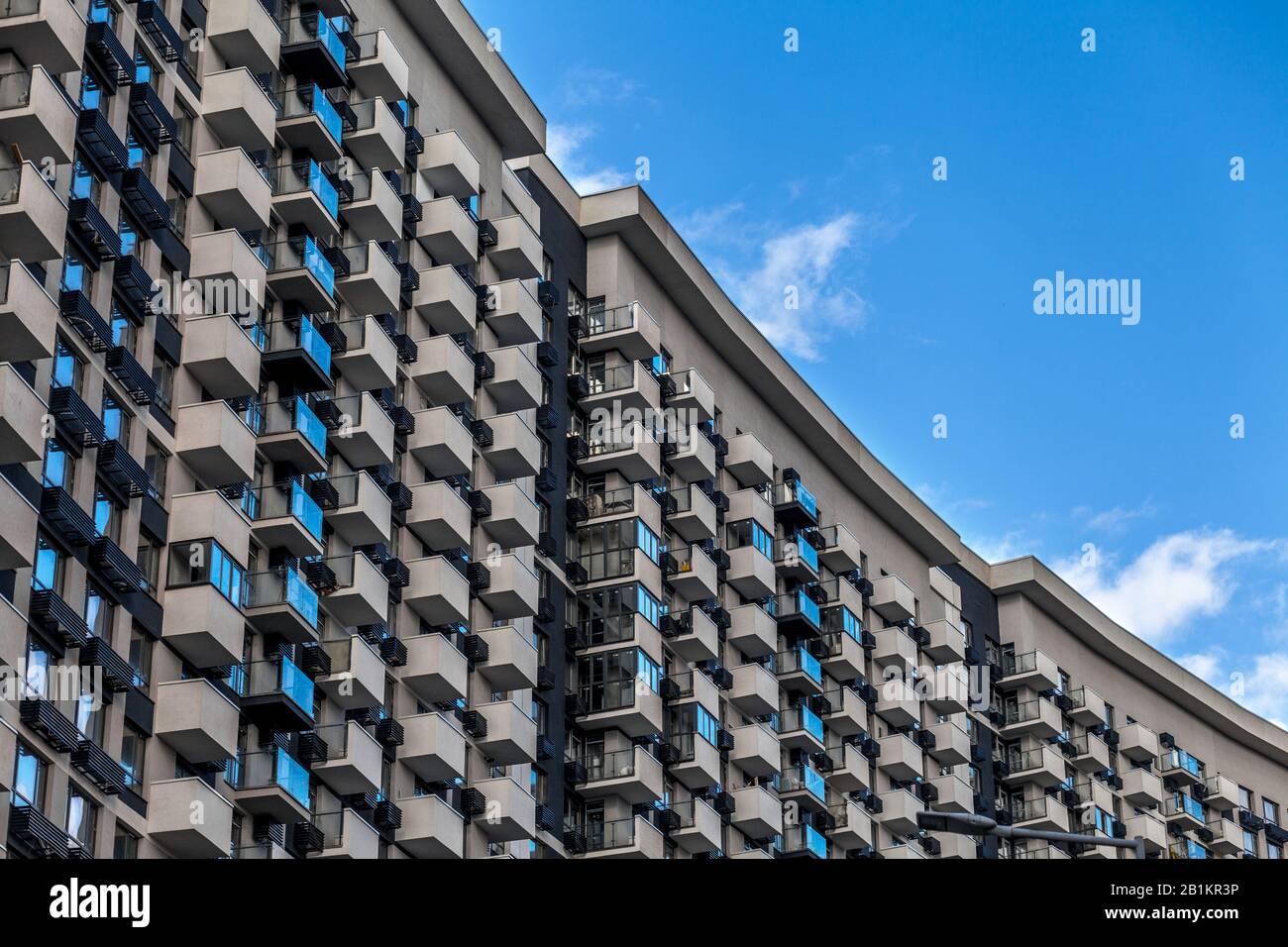 Modern high-rise buildings opposite a clear blue sky in perspective ...