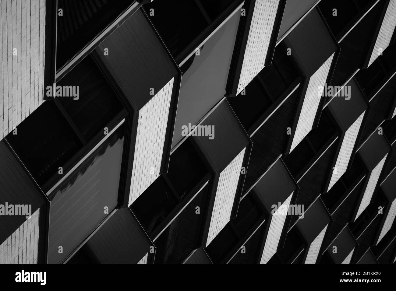 Closeup of exterior of modern building photographed from below creating ...