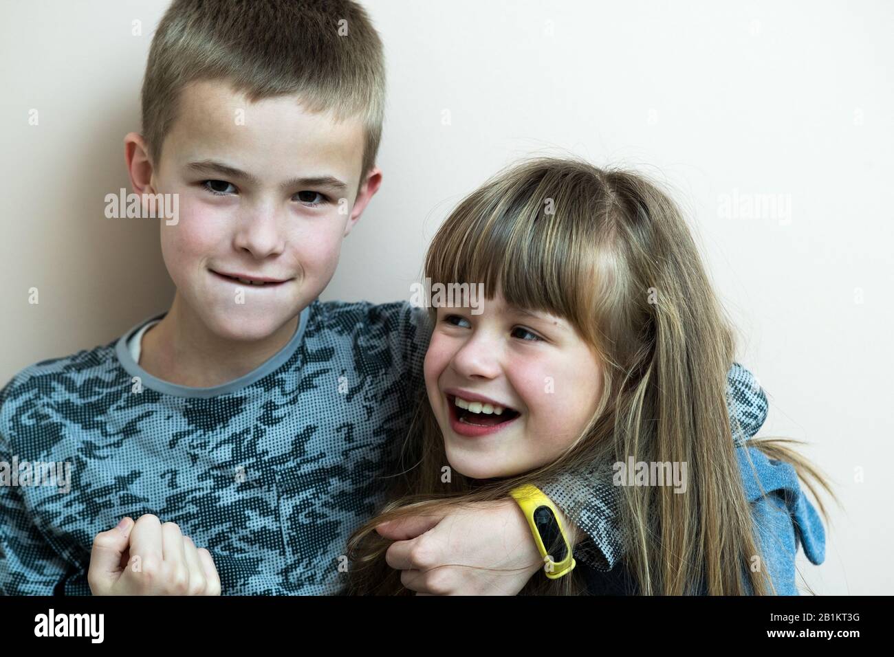 Two children boy and girl fooling around having fun together. Happy ...