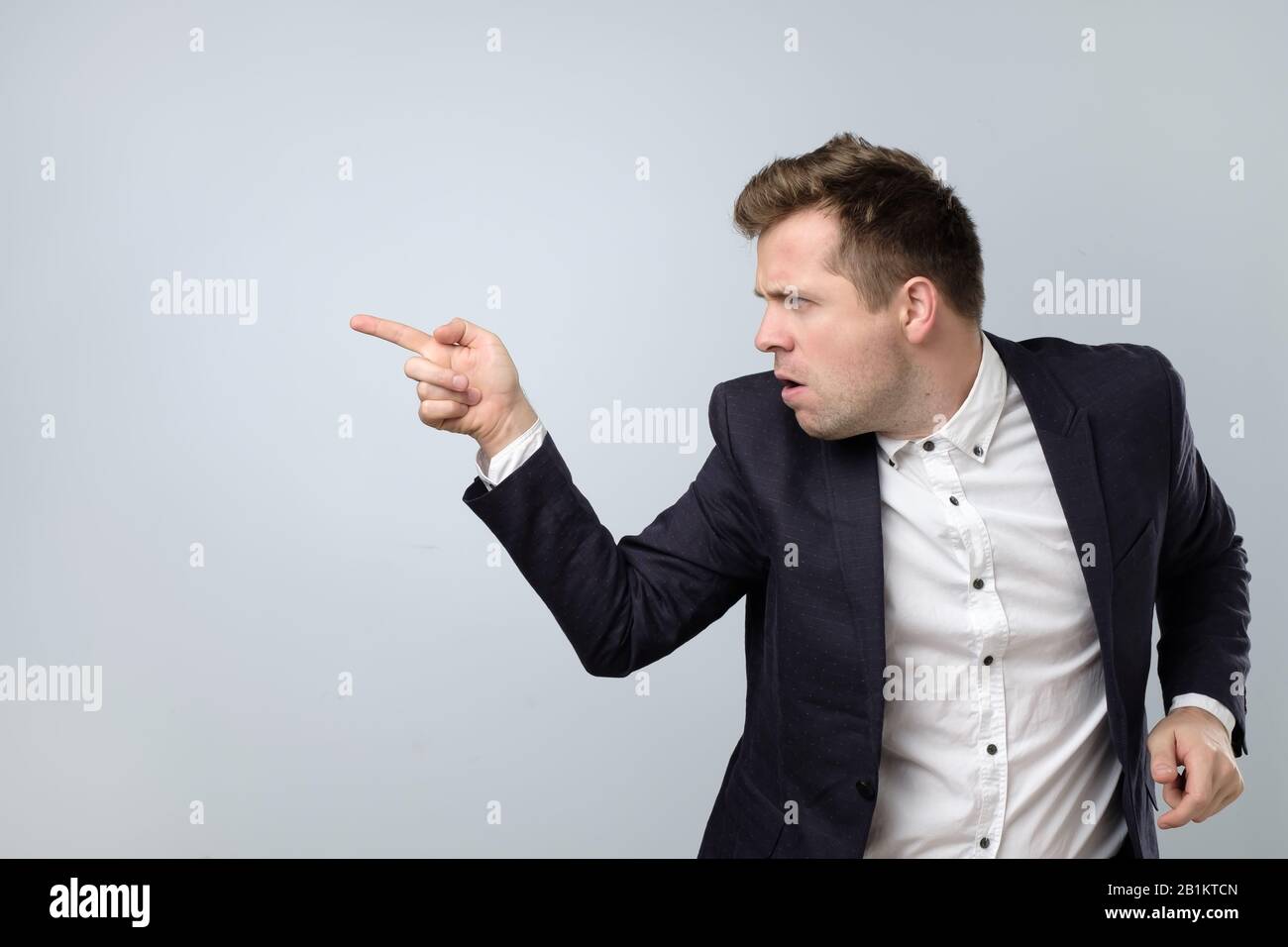 Bond holding gun hi-res stock photography and images - Alamy