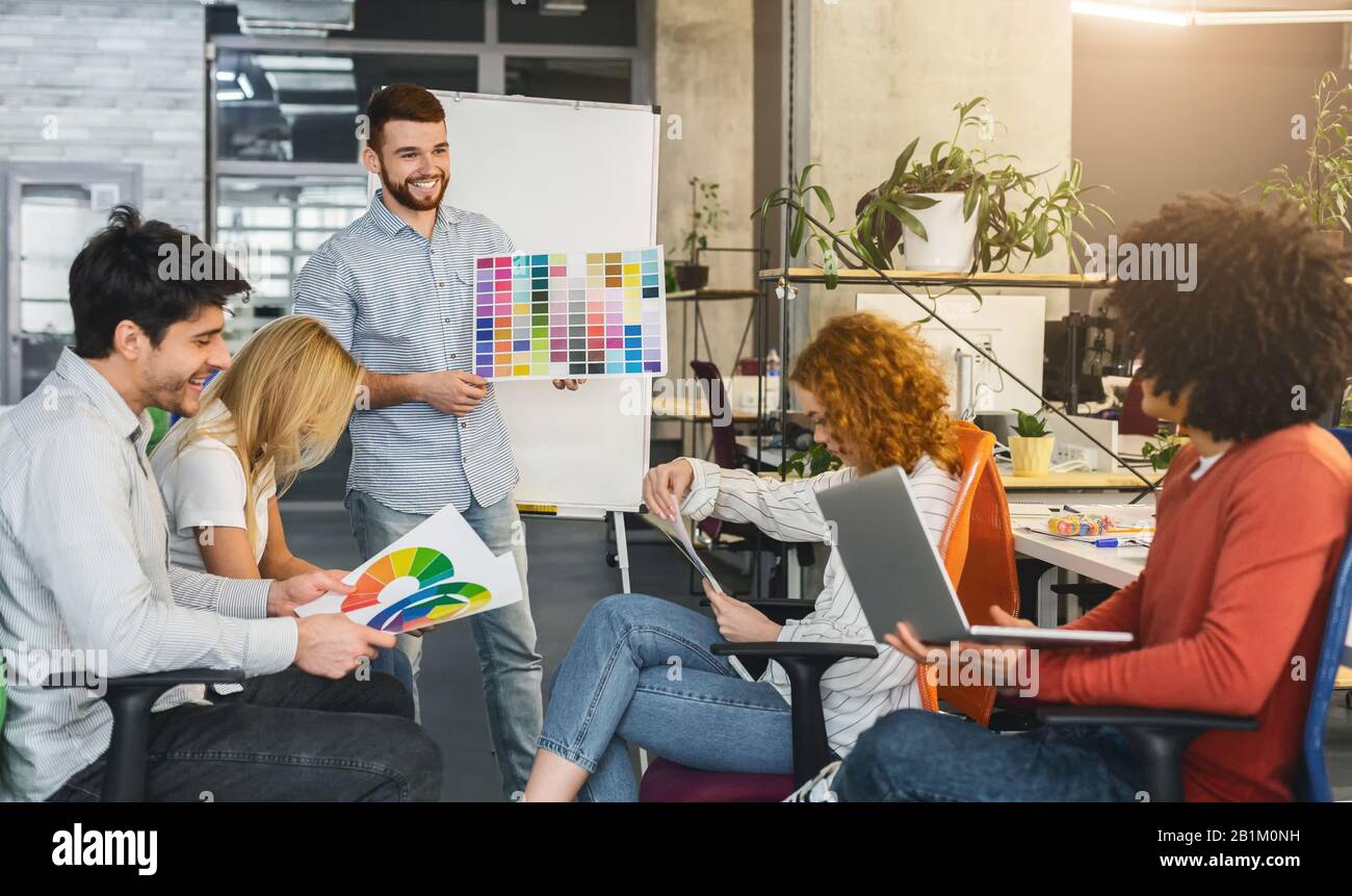 Creative team choosing color design for new project Stock Photo - Alamy