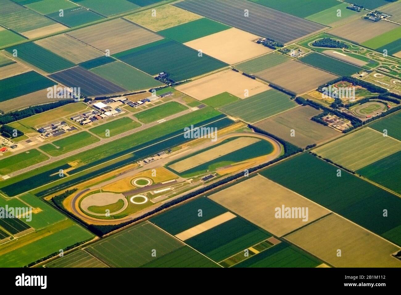 Netherlands, aerial view to fields and tiny airstrip Stock Photo - Alamy