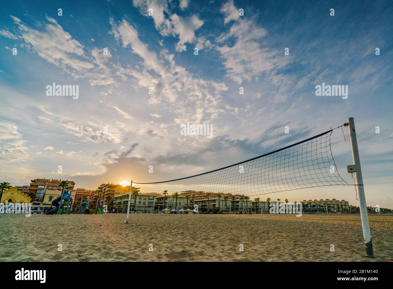Colorful sunset on the beach of Malvarrosa. Valencia, Spain Stock Photo ...