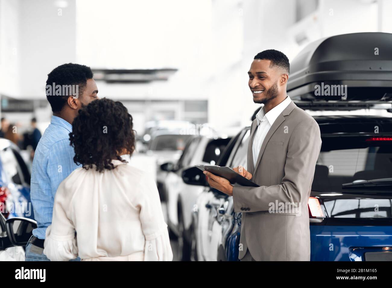Salesman talking family in hi-res stock photography and images - Alamy