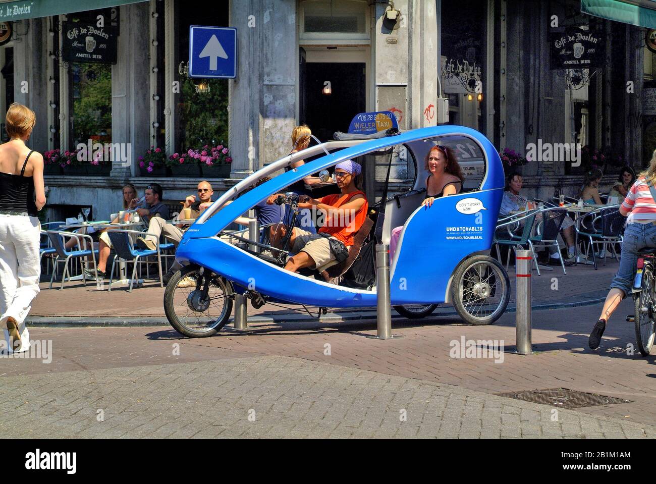 Amsterdam, Netherlands - June 13, 2006: Unidentified people in a new ...