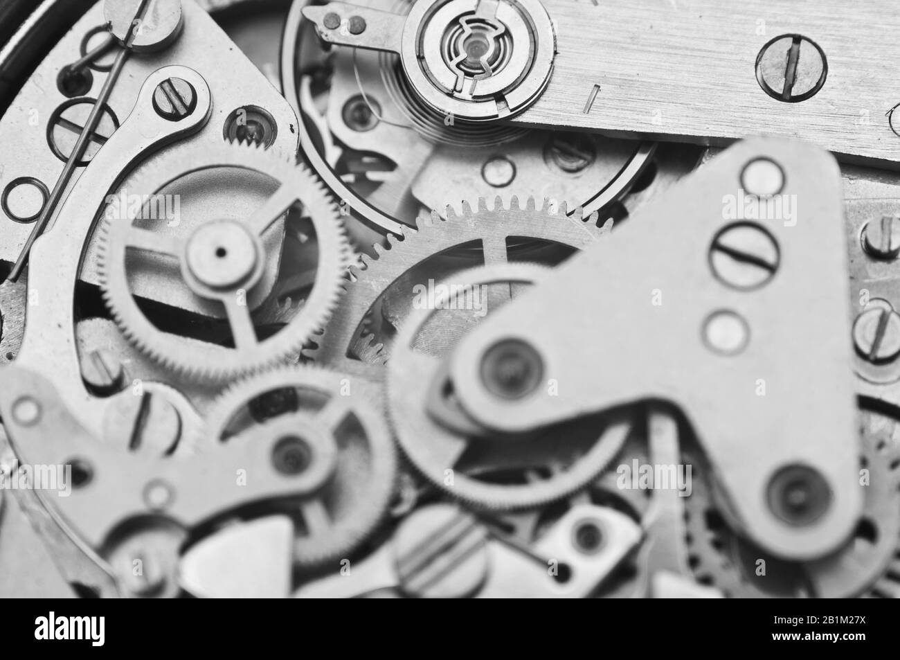 Clockwork, black-and-white gears in an watch. Teamwork concept, idea ...
