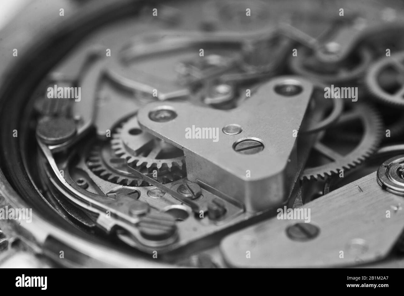 Clockwork, black-and-white gears in an watch. Teamwork concept, idea ...